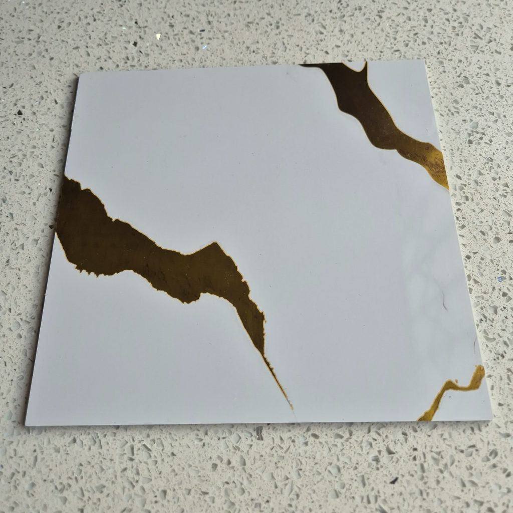 UV Wall Panel Gilded White 1220x2440x2.5mm testing | HDS Cut & Edge Group